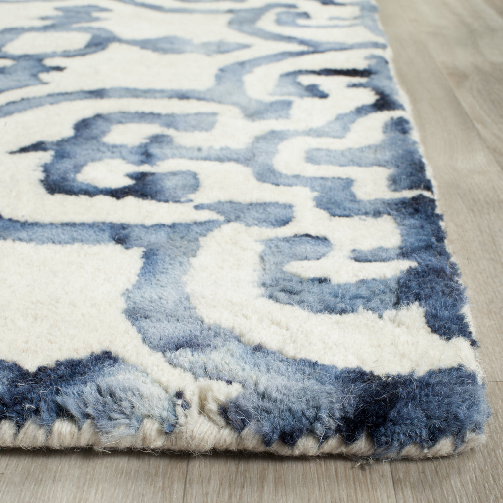 Safavieh Dip Dye 711 Ivory/Navy Area Rug – Incredible Rugs and Decor